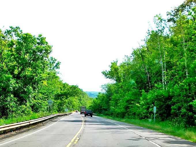 The Saint Croix Scenic Byway unfolds like a green carpet, inviting travelers into Minnesota's lush embrace. Nature's welcome mat at its finest!