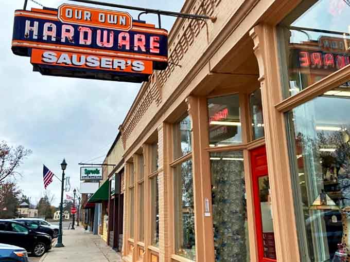 The iconic vintage sign of Sauser's Hardware stands as a beacon of nostalgia in Bigfork, Minnesota, promising an authentic step back in time.