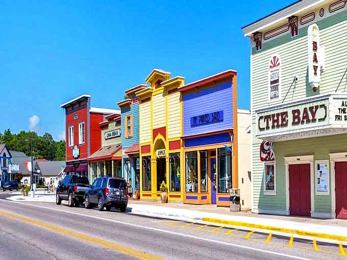 Suttons Bay's rainbow-colored storefronts stand like a welcoming committee, each building promising its own delightful surprise inside.