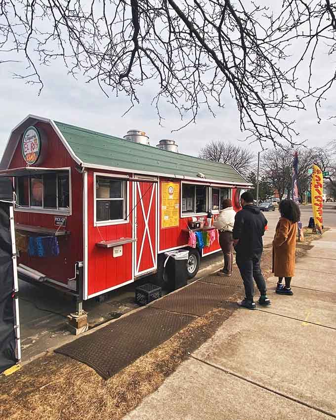 That bright red barn-style food truck isn't a mirage, it's your new favorite lunch spot parked right in Detroit.