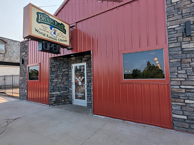 The iconic red exterior of The Brass Rail stands as a beacon for chicken lovers, promising delicious treasures within.