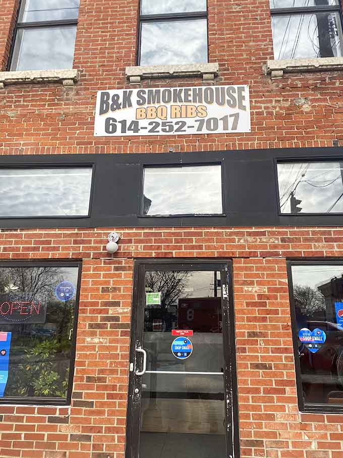 That unassuming brick corner building holds more delicious secrets than a grandmother's recipe box, and the only sign you need is that glorious smoke smell.