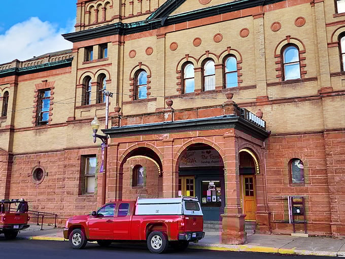 The Calumet Theatre's exterior is like that friend who looks good without trying, all Renaissance Revival elegance and copper-era confidence standing proud.