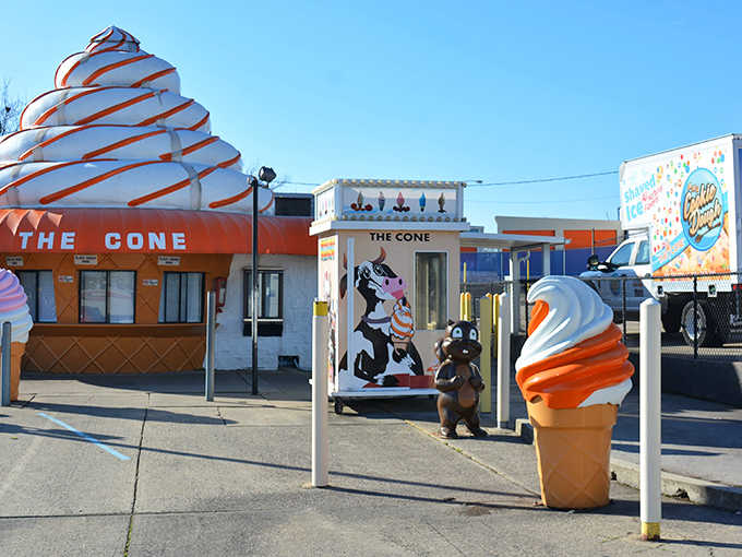 The iconic giant cone structure stands proudly against the blue Ohio sky, beckoning ice cream lovers with its orange-striped magnificence.