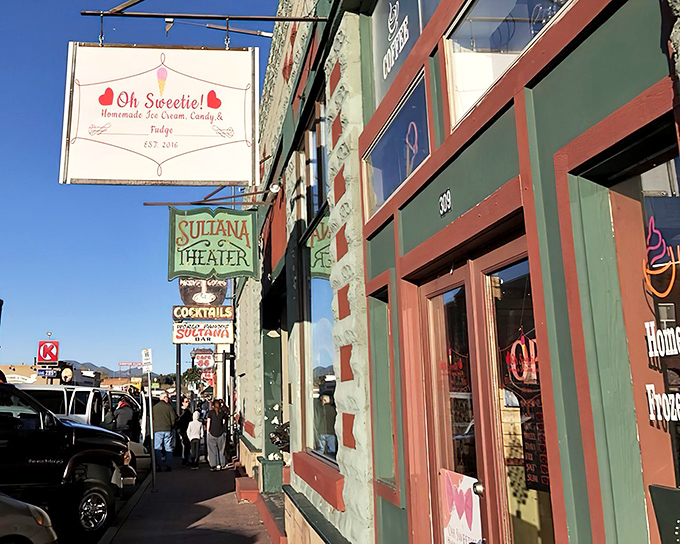 The charming storefront of Oh Sweetie beckons from Williams' historic district, its vintage sign promising sweet treasures within the green and red facade.