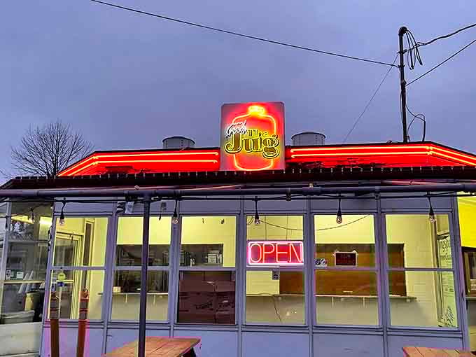 The Jug's neon sign glows like a beacon against the twilight sky, promising comfort food that transcends time and trends in Middletown, Ohio.