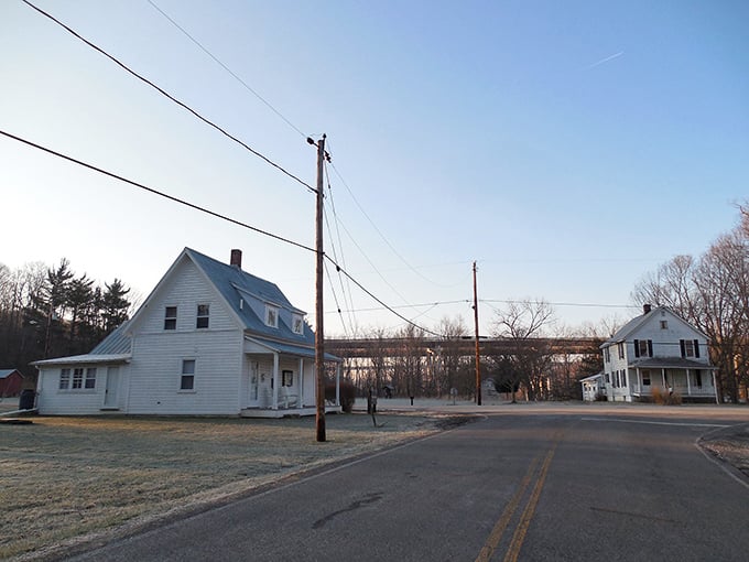 Classic Americana unfolds at this crossroads in Boston Mills, where white clapboard houses stand like sentinels of a quieter time.