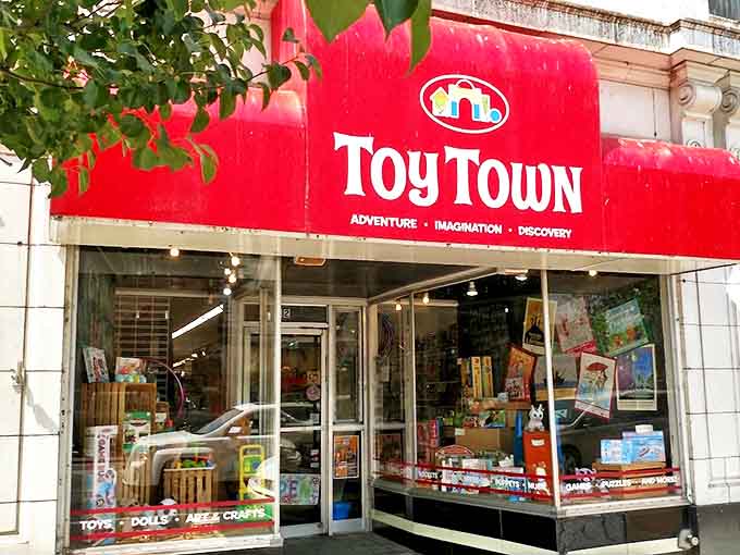 The iconic red awning of Toy Town beckons from Mitchell Street, promising adventures that transcend generations and rekindle childhood wonder.