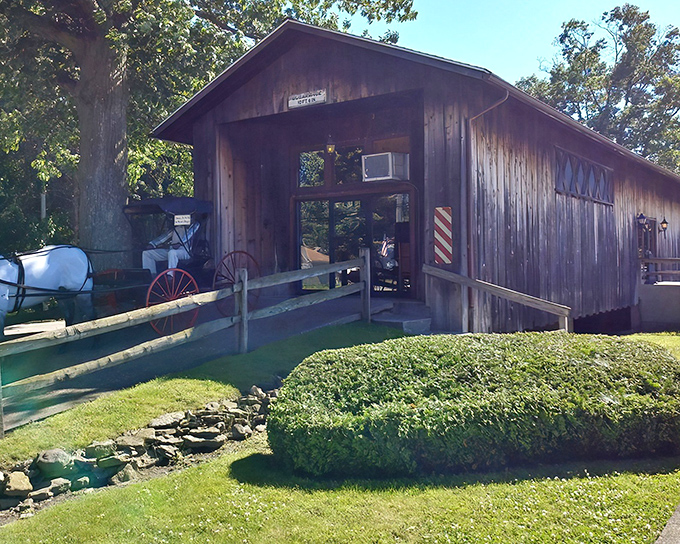 A rustic time capsule with a side of pizza &ndash; the Covered Bridge Pizza Parlor's exterior welcomes hungry travelers with historic charm.