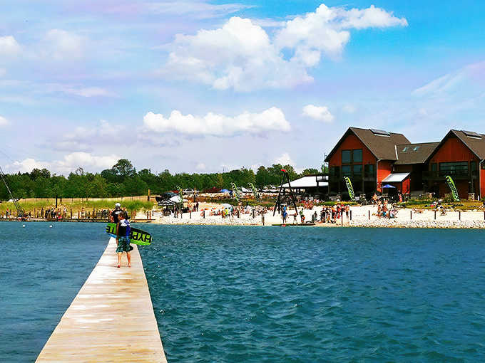 Crystal-clear water meets sandy shores at this Illinois paradise where wakeboarding and burgers coexist in perfect harmony.