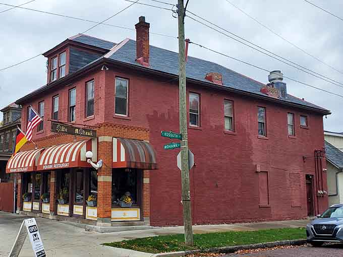 That classic red brick exterior with striped awnings has been welcoming hungry diners since FDR's first term in office.