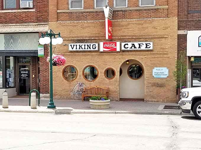 The Viking Caf&eacute;'s charming brick exterior with distinctive porthole windows invites you into a world of breakfast perfection in downtown Fergus Falls.