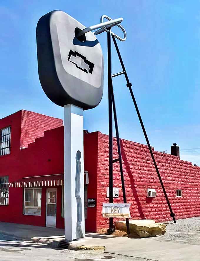 The World's Largest Truck Key stands proudly against a blue Illinois sky, proving that small towns often have the biggest ideas.