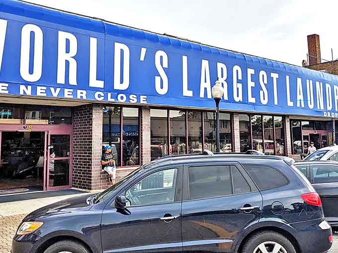 The iconic blue facade announces itself with unmistakable confidence &ndash; this isn't just a laundromat, it's THE laundromat.