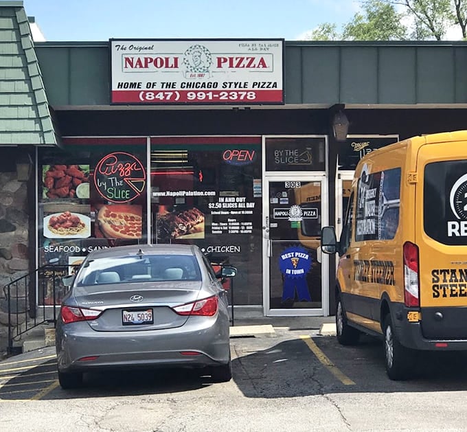 The unassuming storefront hides pizza magic that'll make you a regular faster than you can say "extra cheese."