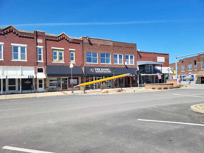 The iconic yellow giant pencil of Casey stretches toward the sky, making visitors feel like they've shrunk to ant-sized proportions.