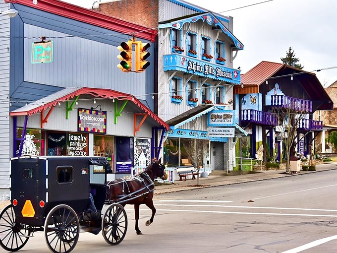 Colorful Swiss-inspired buildings line Sugarcreek's main street, while an Amish buggy clip-clops past &ndash; two worlds blending in perfect harmony.