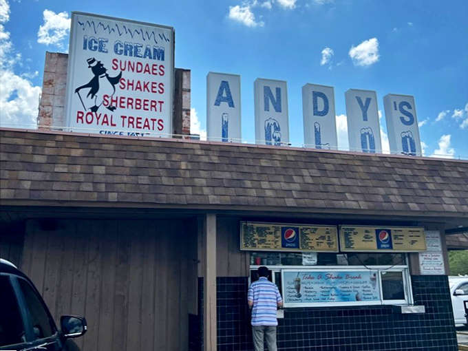 That vintage signage isn't a reproduction; it's the real deal, weathered by decades of Florida sunshine and still beckoning hungry travelers.