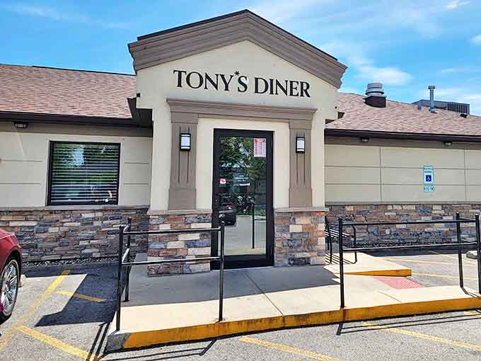 The understated exterior of Tony's Diner hides the breakfast magic happening inside, like Clark Kent in building form.