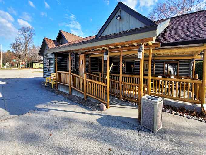 Rustic log cabin charm meets Italian cuisine at Vivio's exterior &ndash; Northern Michigan's delicious contradiction in architectural form.