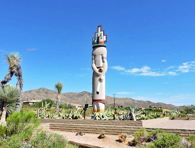 Standing tall against the azure Arizona sky, the world's largest Kachina doll commands attention in Tonto Hills.