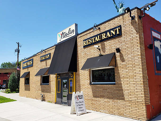 Yarusso Bros Italian Restaurant stands proudly in St. Paul, its brick facade and rooftop Lady Liberty promising authentic Italian flavors with a touch of American charm.