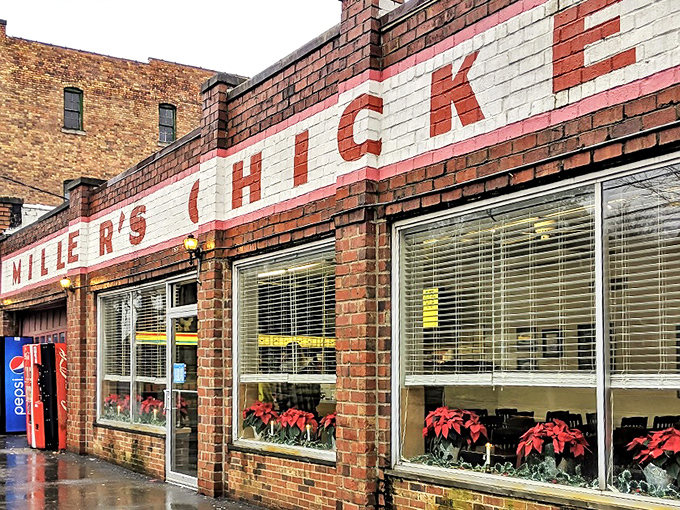The iconic brick facade of Miller's Chicken stands as a beacon of fried deliciousness in Athens, with its classic red lettering promising simple perfection.