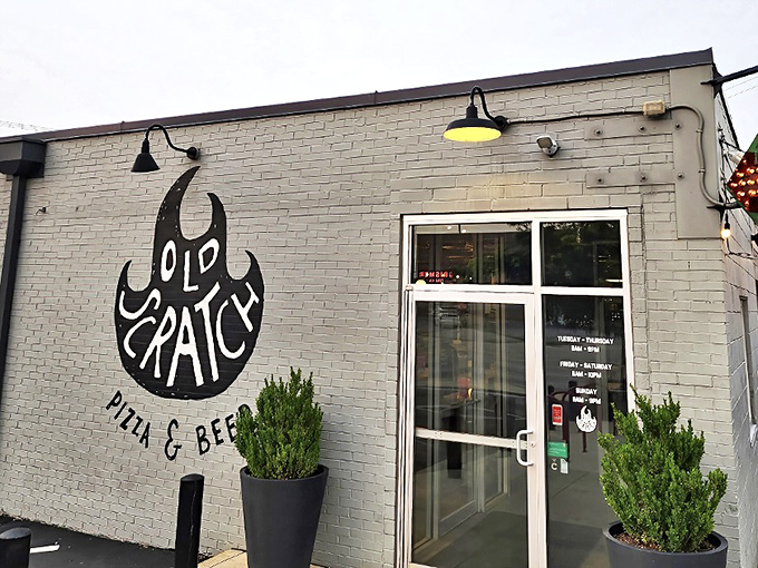 The unassuming exterior of Old Scratch Pizza & Beer belies the flavor explosion waiting inside &ndash; like finding a Ferrari engine in a station wagon.