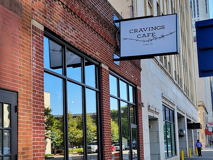 The unassuming brick exterior of Cravings Cafe belies the culinary treasures waiting inside this downtown Columbus gem.