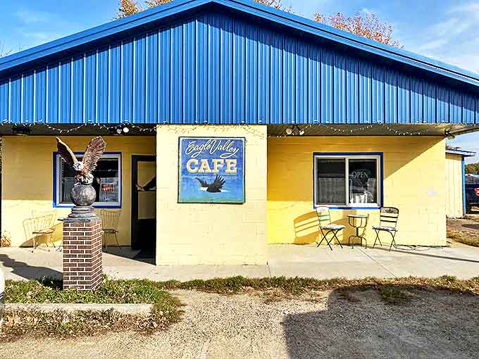 The sunshine-yellow exterior with its bold blue roof isn't just a building &ndash; it's a promise of comfort waiting inside.