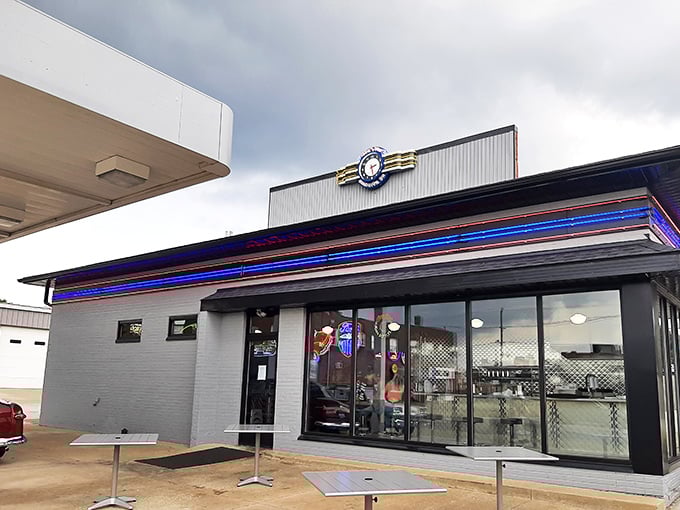 The sleek exterior of Chloe's Diner beckons with its classic blue neon trim and retro styling &ndash; a time machine disguised as a restaurant.