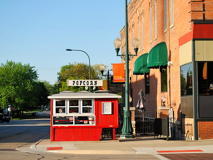 The iconic red popcorn stand sits proudly on Sycamore's corner, a bright beacon of buttery goodness that's been tempting locals since 1896.