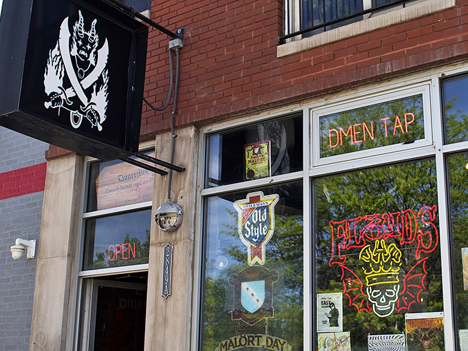 The iconic DMen Tap storefront beckons adventurers with its devilish logo and neon promise of good times within.
