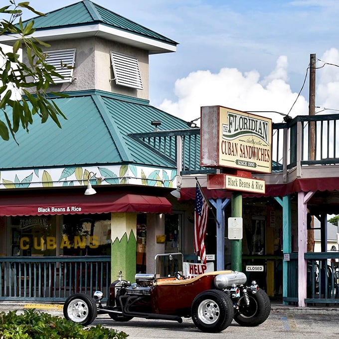 The iconic mint-green exterior of The Floridian beckons hungry visitors with its vintage charm and the promise of Tampa Bay's best Cuban sandwiches.