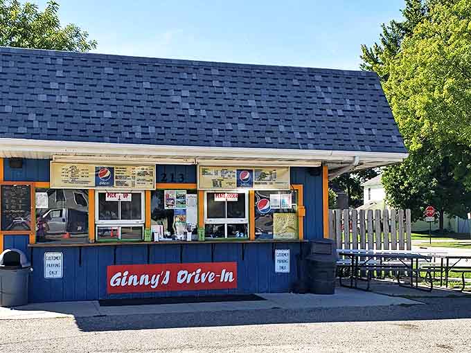 The iconic blue exterior of Ginny's Drive-In stands like a beacon of nostalgia in West Concord, promising sweet memories with every visit.