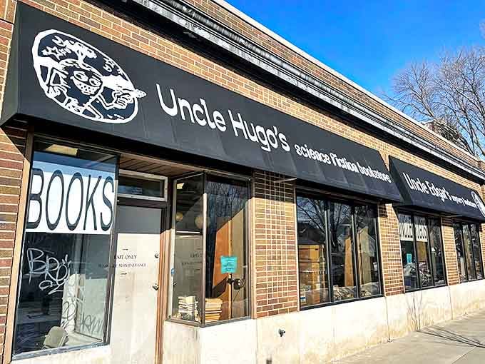 The iconic black storefront of Uncle Hugo's beckons sci-fi enthusiasts like a literary lighthouse on East 31st Street in Minneapolis.