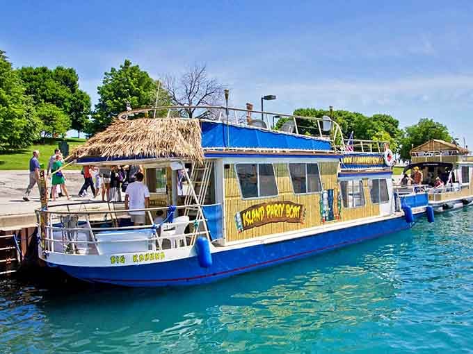 The Island Party Boat's bamboo-clad exterior and thatched roof create an instant tropical escape against Chicago's stunning blue waters.