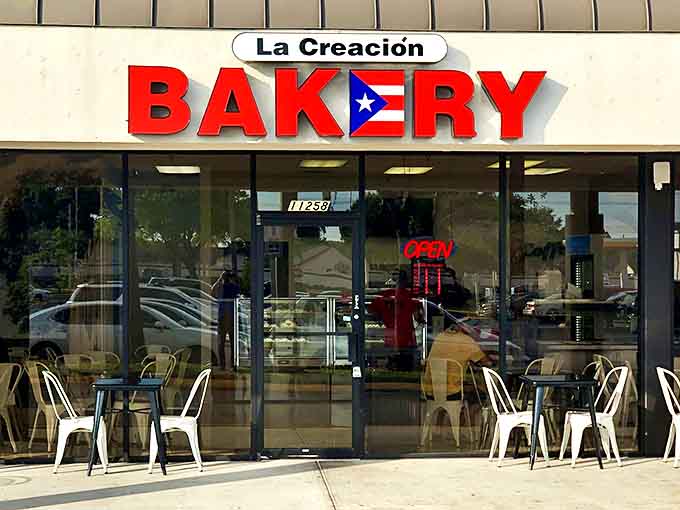 The bold red sign with the Puerto Rican flag proudly announces what locals already know: culinary magic happens inside these doors.