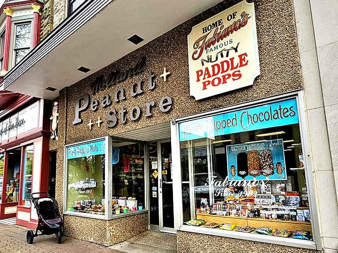 The iconic red storefront of Bryant-Lake Bowl beckons passersby with its vintage neon glow, promising good times inside.