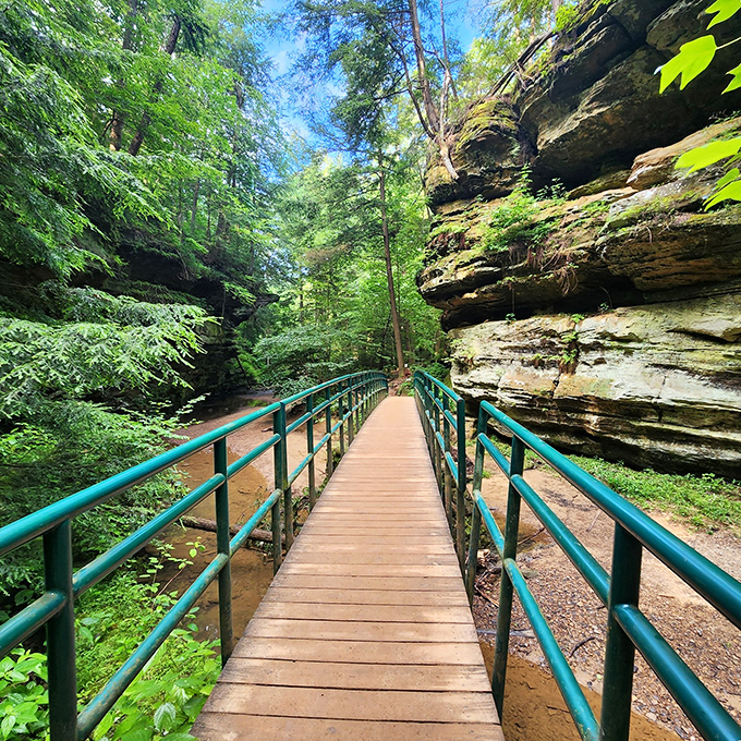 A wooden boardwalk cutting through towering cliffs &ndash; nature's version of the yellow brick road, minus the singing munchkins.