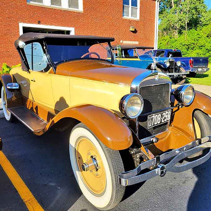 The 1927 Packard's butterscotch finish and gleaming details showcase an era when cars weren't just transportation &ndash; they were rolling jewelry.