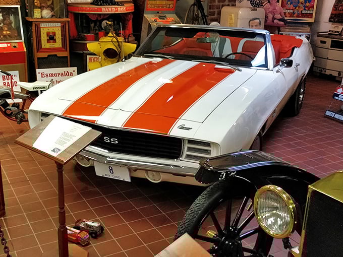 The 1969 Camaro's racing stripes aren't just decoration&mdash;they're a promise of the kind of acceleration that pins you to your seat like invisible hands.