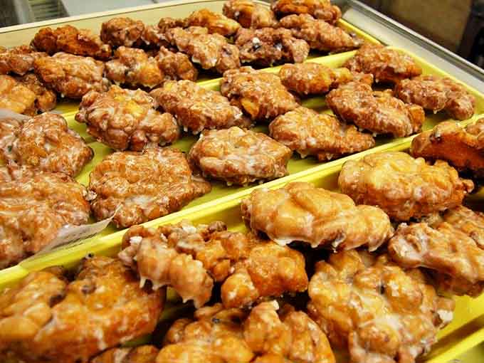 Apple fritters that could make an orchard jealous &ndash; each one a craggy landscape of cinnamon-spiced paradise that demands to be savored.