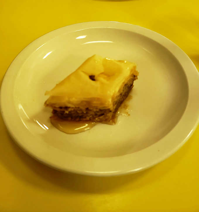 Layers of flaky phyllo dough and honey-sweetened nut filling make this baklava an unexpected treasure at a classic American diner.