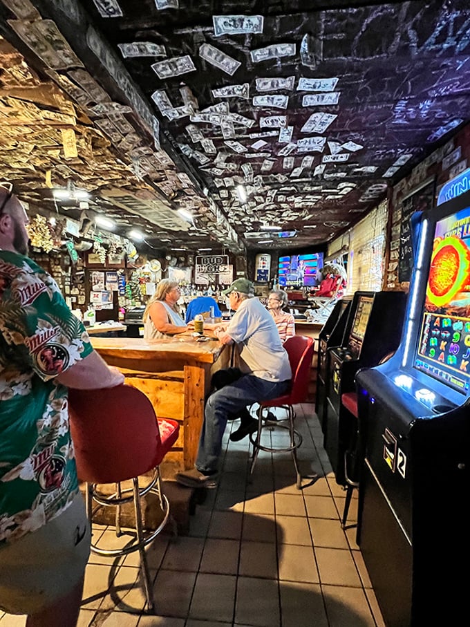 The ceiling's dollar bill collection started as tradition, became decoration, and now serves as the most unique savings account in Wisconsin.