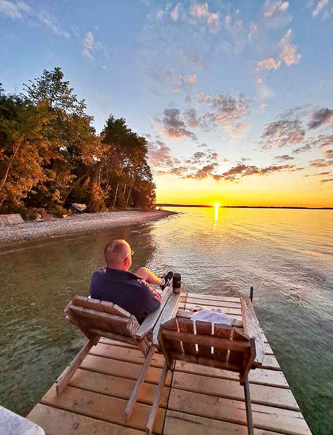 Sunset transforms a simple dock into front-row seats for nature's nightly masterpiece &ndash; Michigan magic at its most mesmerizing.