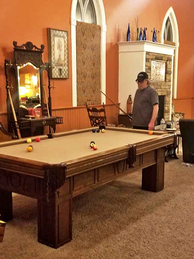 Rack 'em up in this game room where the crack of billiard balls echoes like percussion in the former church's perfect acoustics.