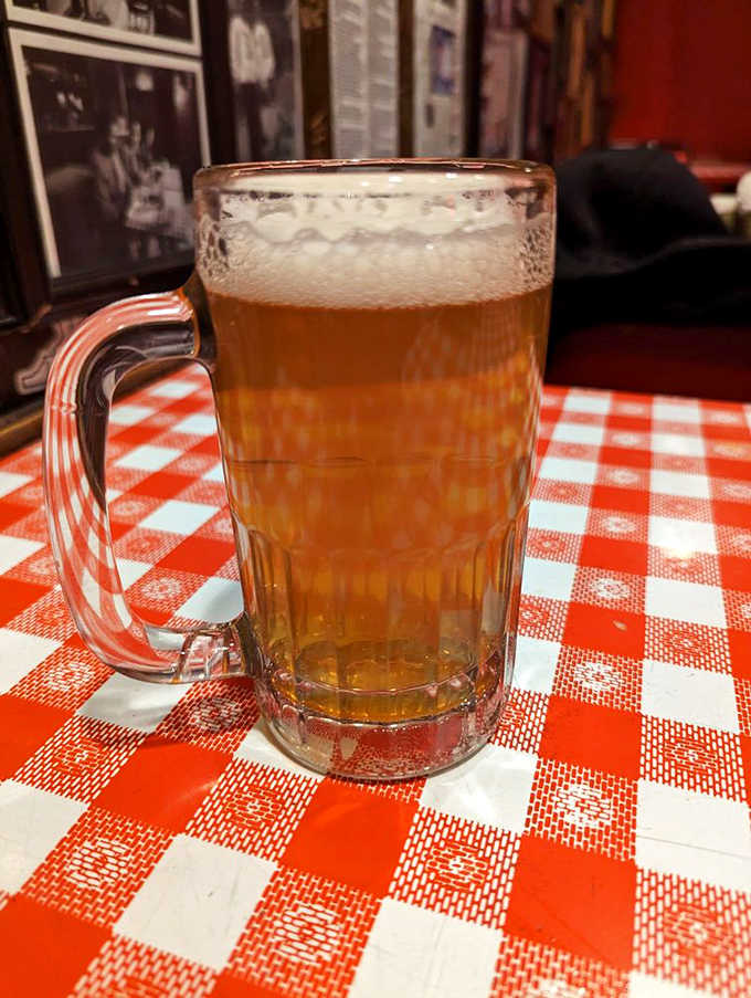 Beer served in a proper mug with no pretension &ndash; cold, refreshing, and the perfect companion to whatever "cheezborger" you've chosen.