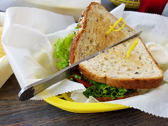BLT Sandwich: Simplicity elevated &ndash; crisp lettuce, ripe tomato, and bacon that's achieved that perfect balance between chewy and crisp, all embraced by toasted bread.