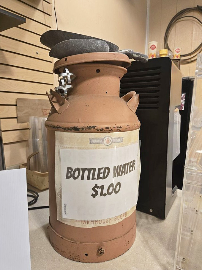 Even the water comes with a side of nostalgia, served from a vintage milk can that would make any antique collector swoon.